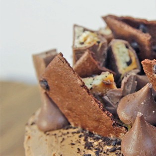 WATCH: Decorate a Cake Using Candy Bars